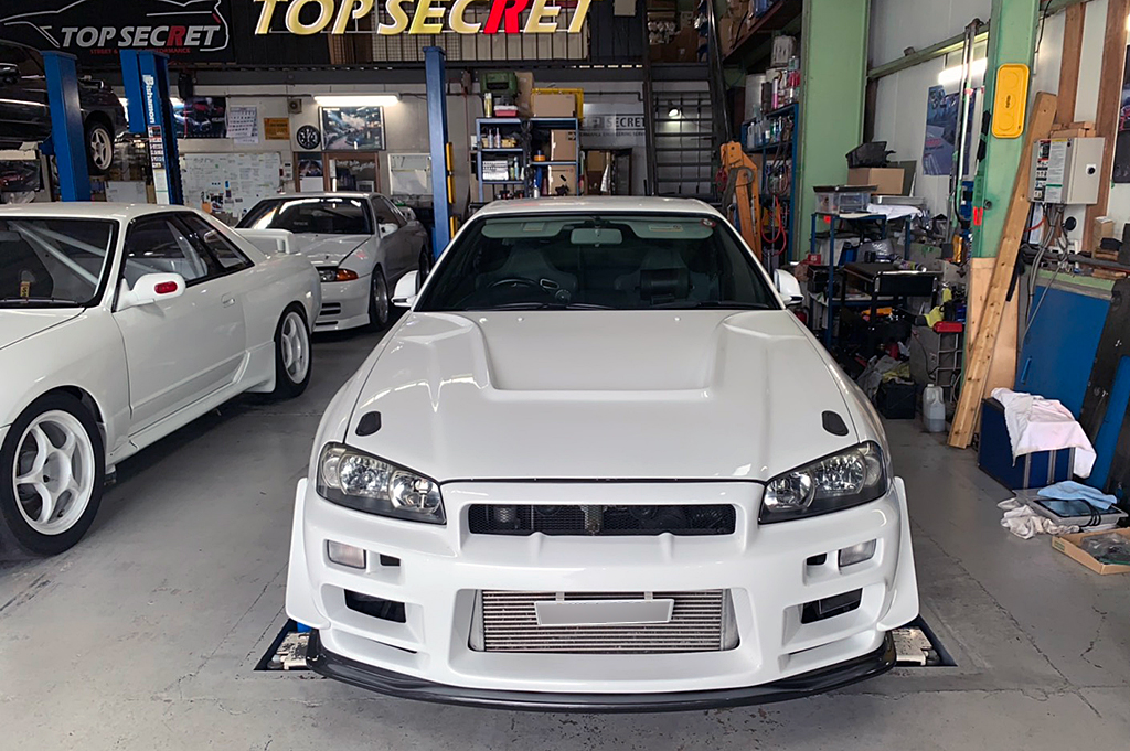 [Sold]BNR34 GT-R White – TOPSECRET