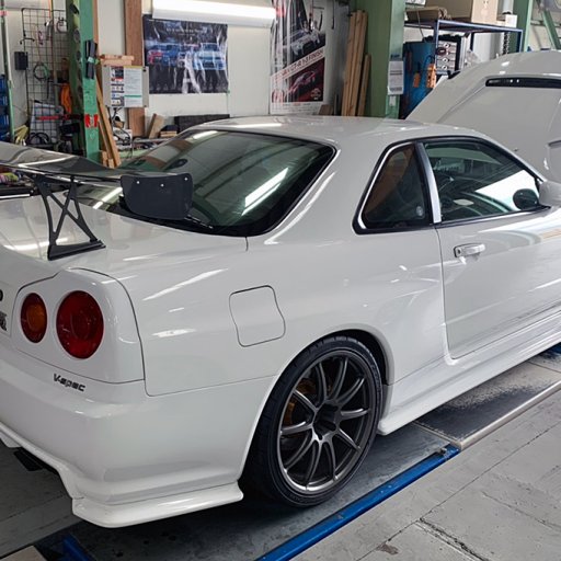 [Sold]BNR34 GT-R White – TOPSECRET