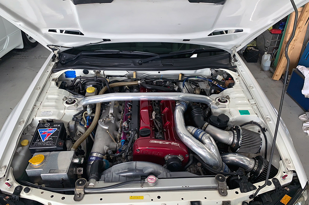 [Sold]BNR34 GT-R White – TOPSECRET